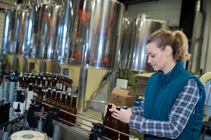 Worker Taking Bottles for Packaging Stock Image - Image of clean, food ...