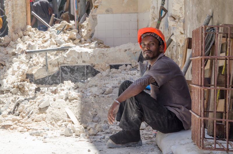 Worker taking break editorial image. Image of rest, stone - 62731335