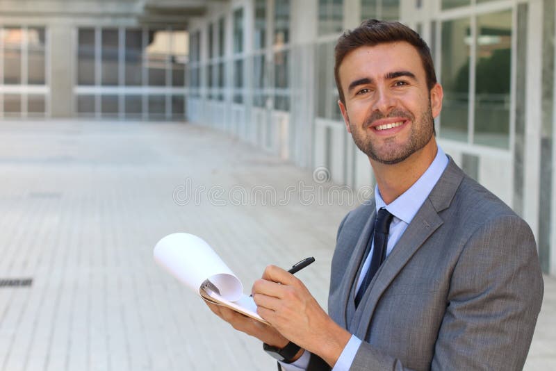 Worker Taking Notes during an Interview Stock Image - Image of handsome ...