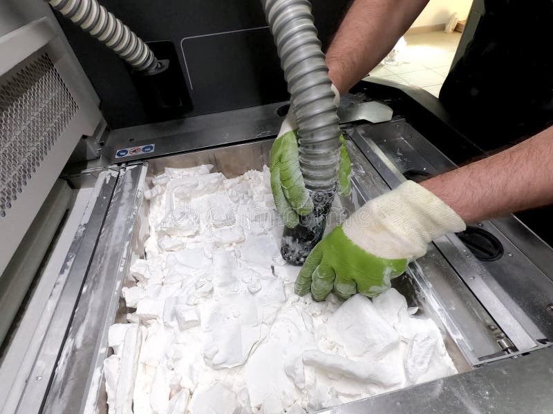 Worker Taking Out Models of White Polyamide Powder and Cleaning Them ...
