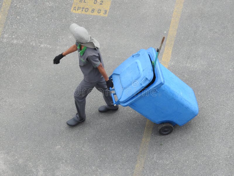 Worker Taking Out the Trash. Stock Image - Image of worker, clothing ...