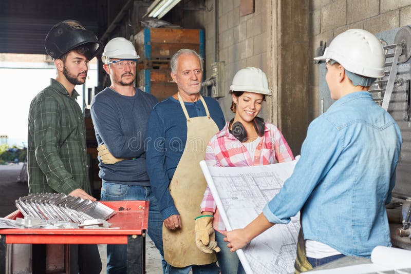 Worker Team in the Company when Planning the Production Stock Photo ...
