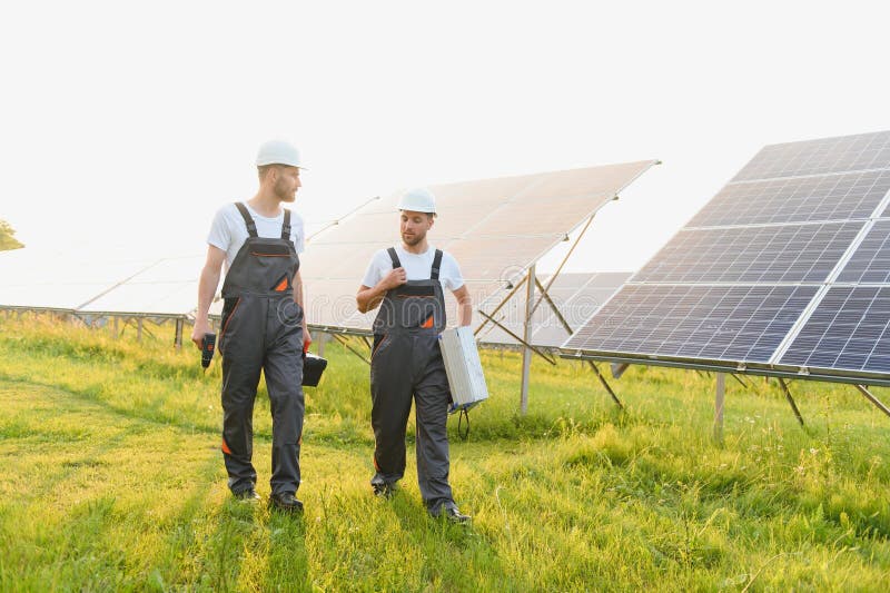 Worker Team with Solar Panel. Worker Team Has Success Install Solar ...