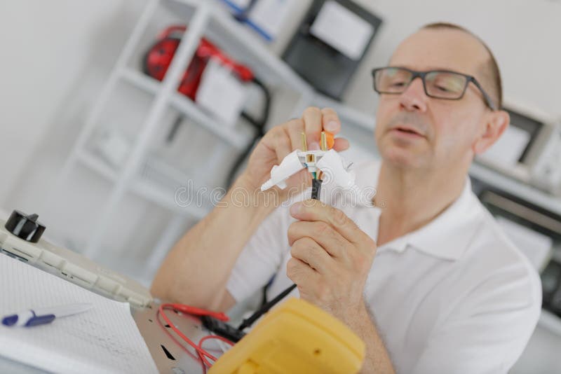 Worker Testing Electrical Components Stock Image - Image of ...
