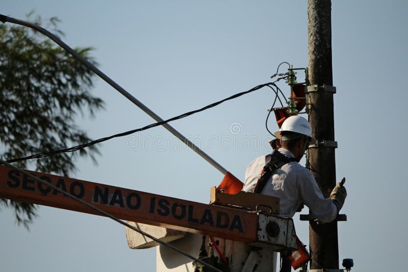 Brazil - Man Doing the Maintenance of the Electric Network Editorial ...
