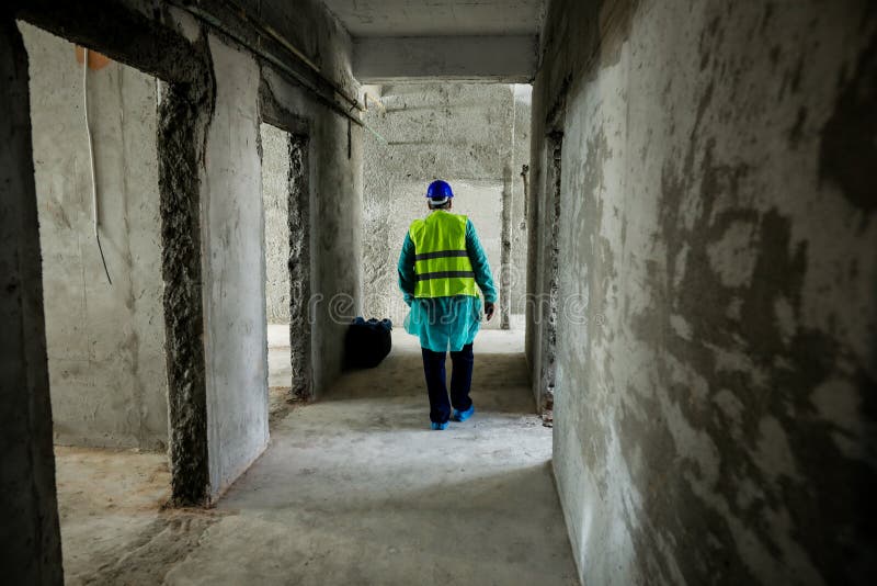 Worker in an Unfinished Building on a Hospital Construction Site Stock ...