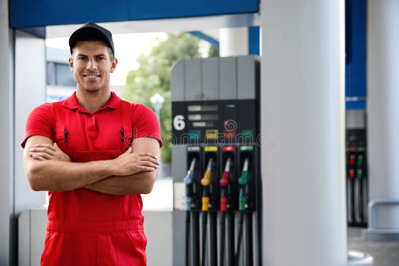 Worker in Uniform at Modern Gas Station Stock Image - Image of power ...