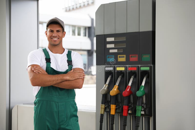 Worker in Uniform at Modern Gas Station Stock Image - Image of happy ...