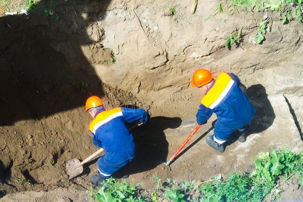 Worker in uniform editorial photo. Image of blue, dirt - 162796106
