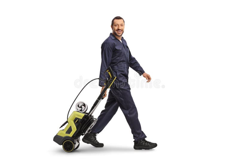 Worker in a Uniform Walking with a High Pressure Washer Machine Stock ...
