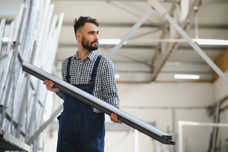 Worker in Uniform Working on Machine in PVC Shop Indoor Stock Image ...