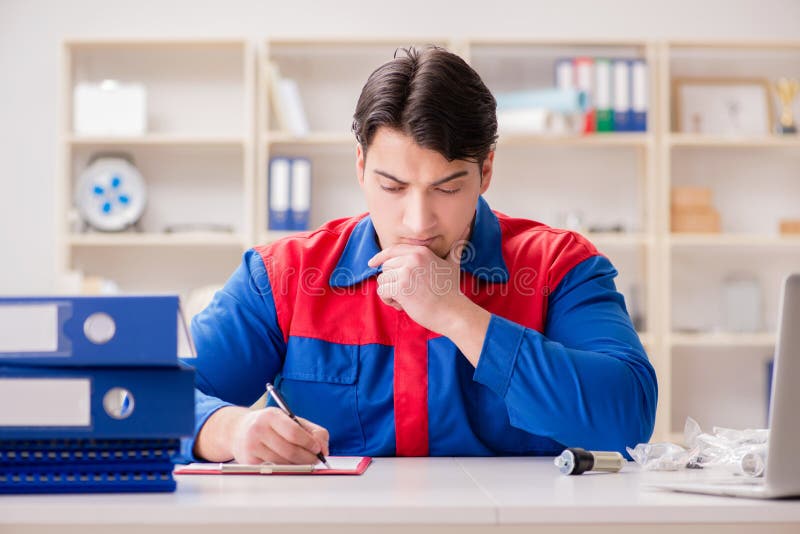 The Worker in Uniform Working on Project Stock Photo - Image of builder ...