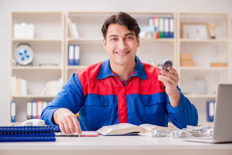 The Worker in Uniform Working on Project Stock Photo - Image of ...