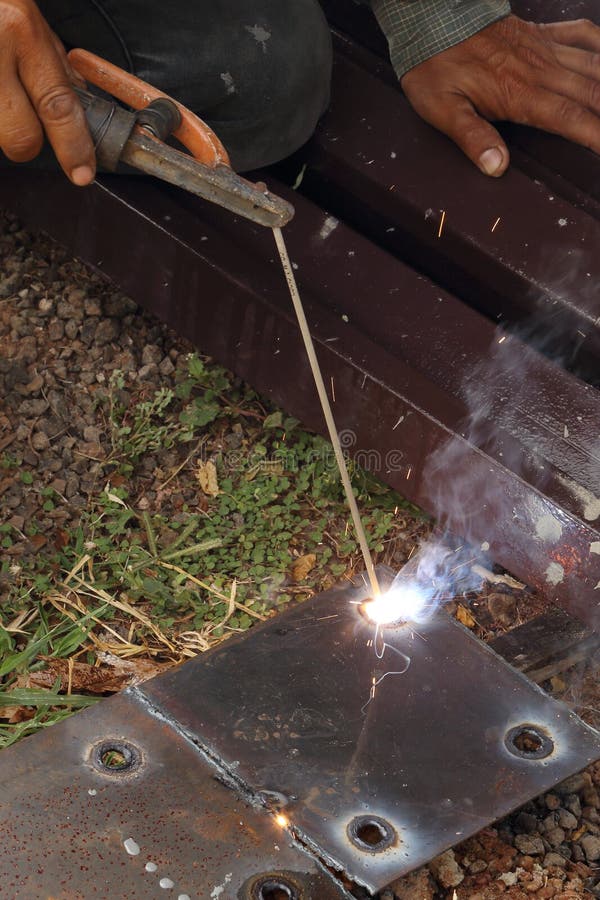 Electric Welding Connecting Square Bar Stock Image - Image of flash ...