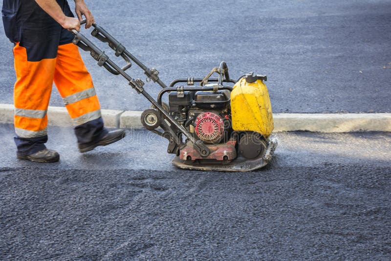 Worker Use Vibratory Plate Compactor Stock Photo - Image of machine ...