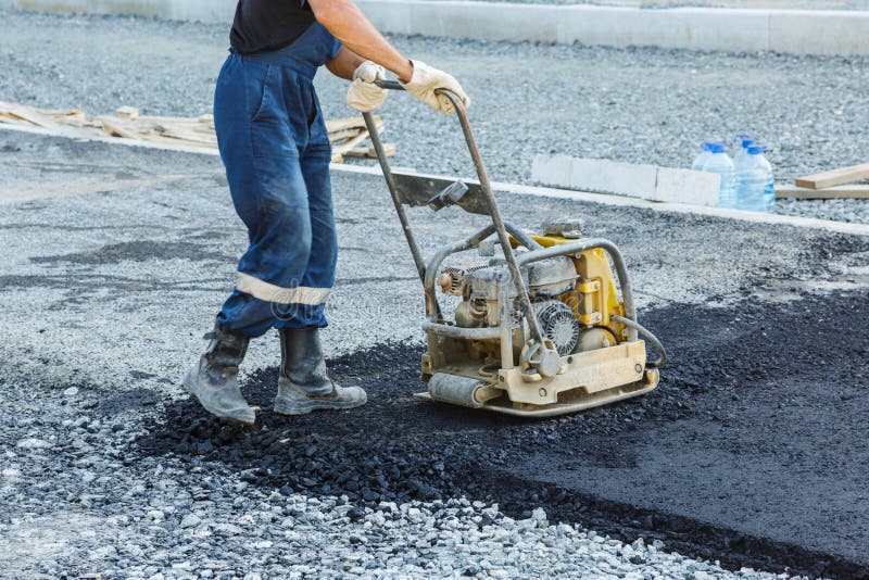 Worker Use Vibratory Plate Compactor Stock Image - Image of asphalting ...