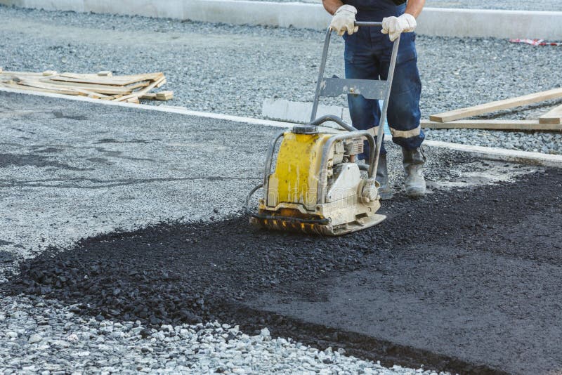 Worker Use Vibratory Plate Compactor Stock Image - Image of highway ...