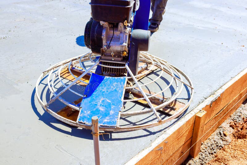 Concrete Finishing Process Takes Place on Construction Site with ...