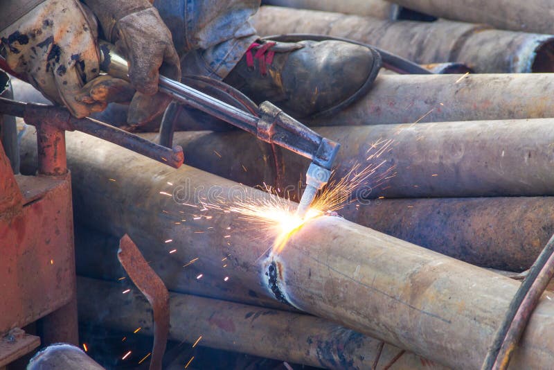 A Worker Uses a Oxygen Acetylene Cutting Stock Photo - Image of glow ...
