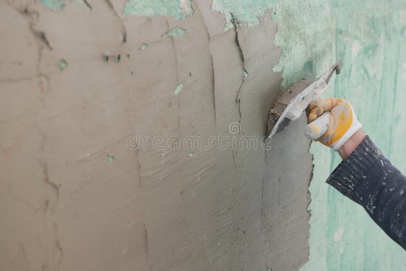 Worker Applying Plaster To a Wall during Renovation Process Stock Image ...