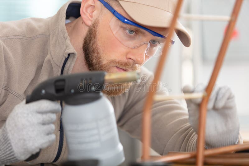 Worker Using Blowtorch for Soldering Copper Stock Image - Image of heat ...