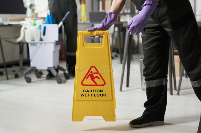 Worker Using Caution Tablet during Cleaning Stock Photo - Image of ...