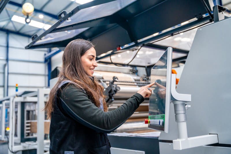 Worker Using a Cnc Machine To Control an Industrial Crane Stock Photo ...