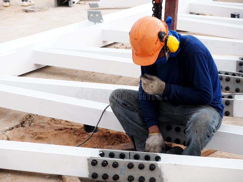 Worker Using a Drill in a Construction Stock Photo - Image of drilling ...