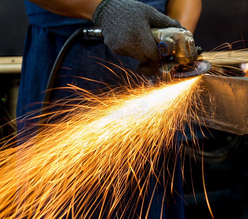 Worker Using Electric Grinder Stock Photo - Image of cuts, machinery ...