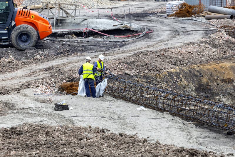 Worker Using Equipment for Construction Analysis Editorial Photo ...