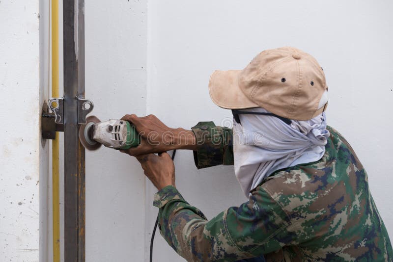 Worker Using Grinder To Grinding Metal Stock Photo - Image of industry ...