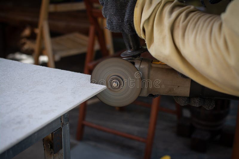 Worker Using a Grinding Machine for Cut Cement Board Stock Image ...