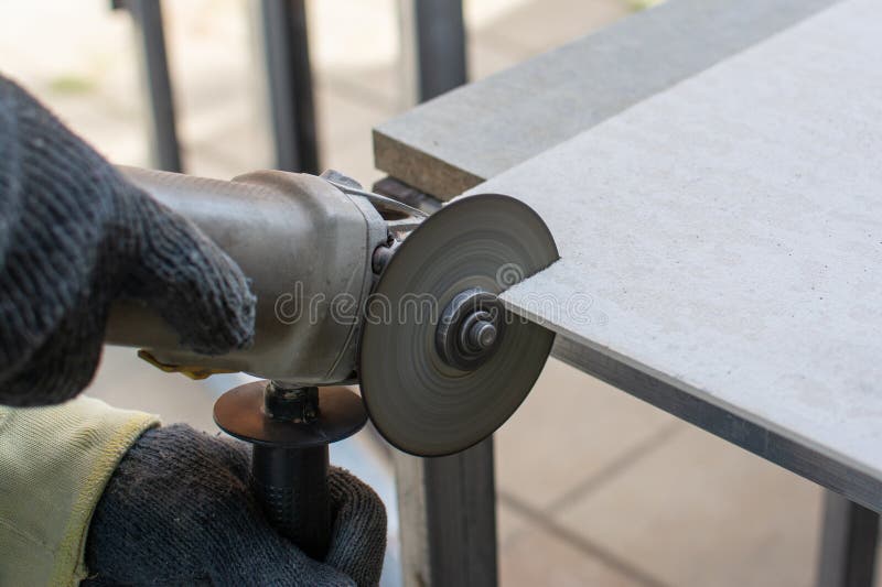 Worker Using a Grinding Machine for Cut Cement Board Stock Image ...