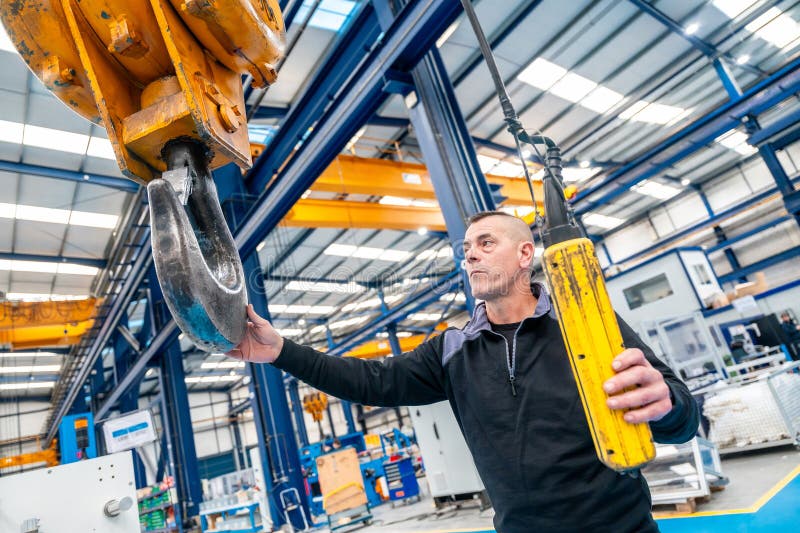 Worker Using an Industrial Cane Working in a Logistics Center Stock ...