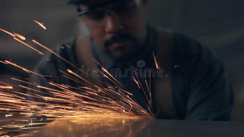 Worker Using Industrial Grinder Stock Image - Image of bright, heat ...