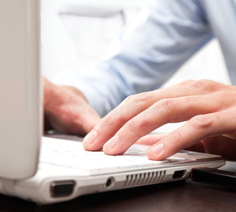 Worker using a laptop stock image. Image of corporate - 20188139