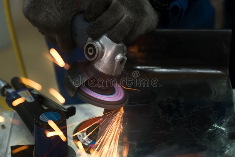 Worker Using Machine for Coating and Overlay Steel for Maintenance and ...