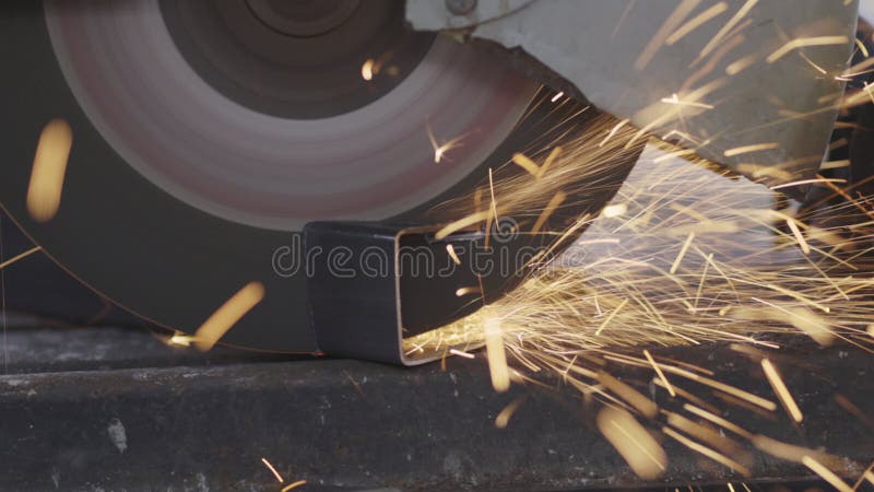 Worker Using Metal Cutting Circular Saw Blade in Construction Site ...