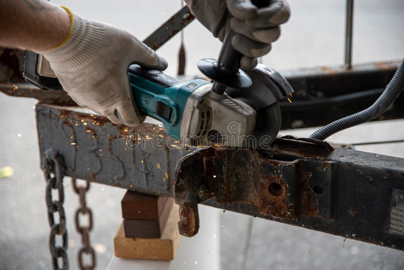 Worker Using a Metal Grinder Machine Stock Image - Image of light ...