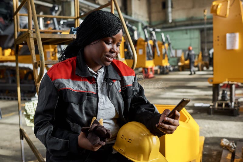 Worker Using Mobile Phone during Her Break Stock Image - Image of ...