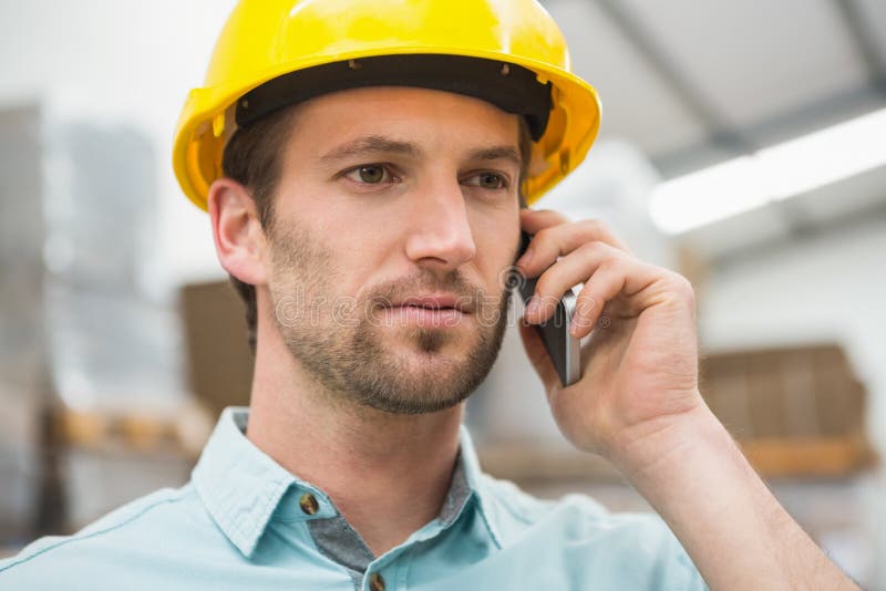 Worker Using Mobile Phone in Warehouse Stock Photo - Image of cellphone ...