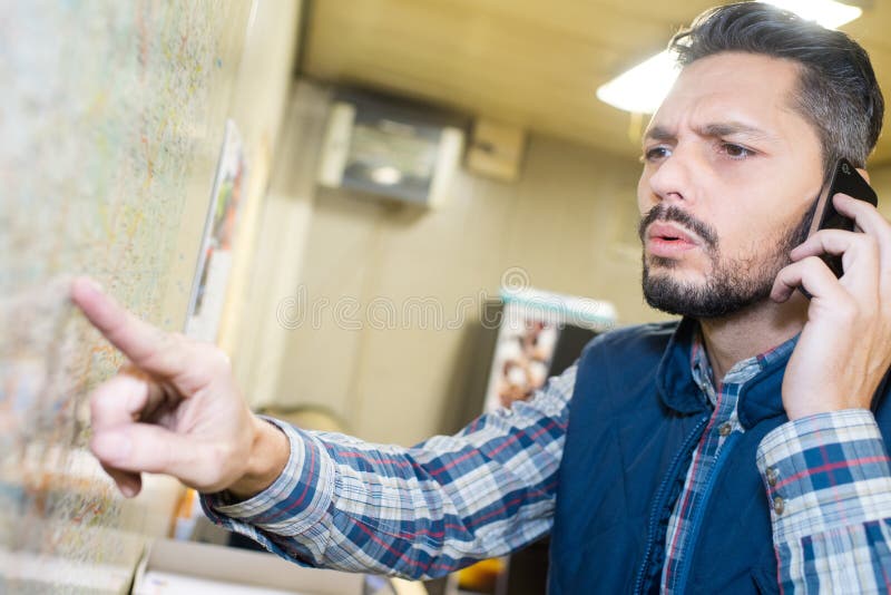 Worker Using Phone in Warehouse Stock Photo - Image of businessman ...
