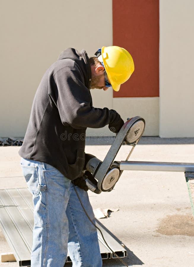 Worker Using Porta-Band Saw Stock Image - Image of jeans, industrial ...
