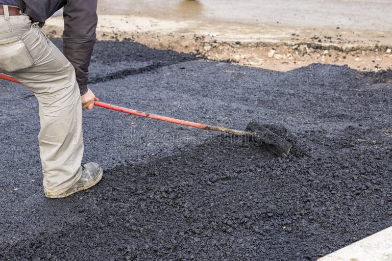 Worker Using Rake To Level Asphalt Pavement 3 Stock Image - Image of ...