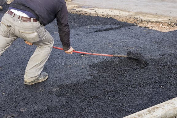 Worker Using Rake To Level Asphalt Pavement 4 Stock Image - Image of ...