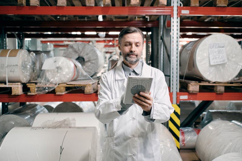 Worker Using Tablet at the Factory Stock Photo - Image of technology ...