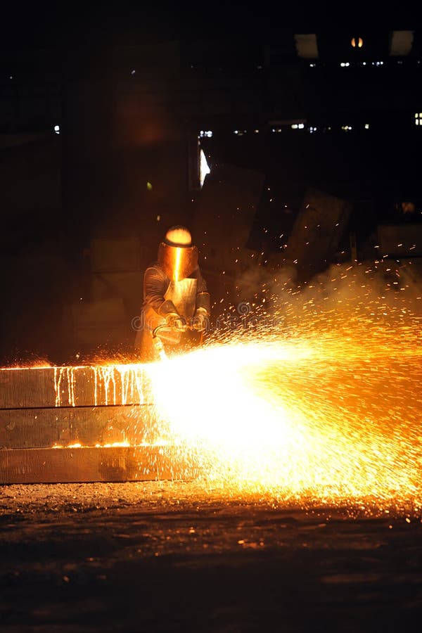 Worker Using Torch Cutter To Cut through Metal Stock Image - Image of ...