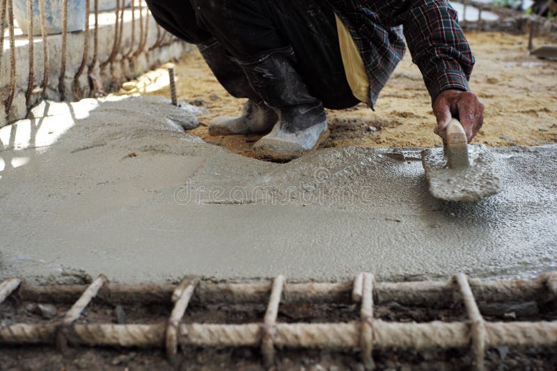 Worker Using Trowel for Level the Concrete Floor Stock Photo - Image of ...