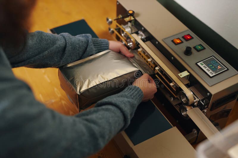 Worker Using Vacumizer stock photo. Image of factory - 363900250