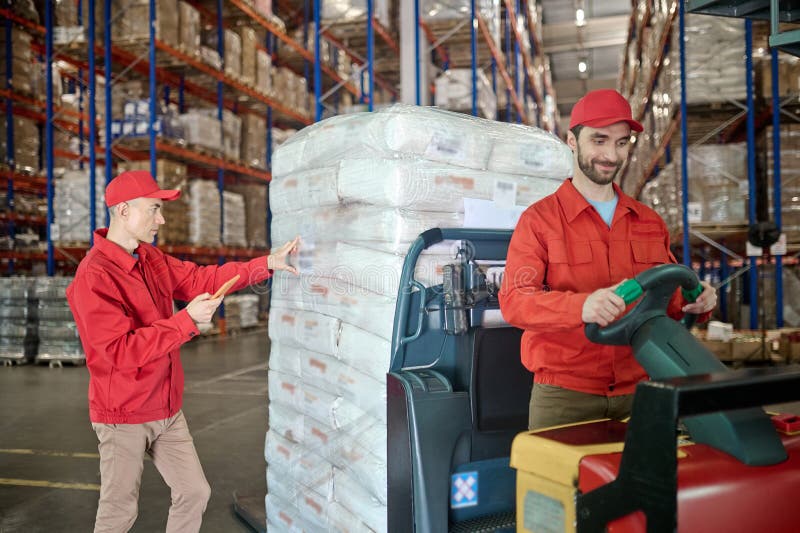 Experienced Stockhouse Staff Preparing Merchandise for Shipping Stock ...